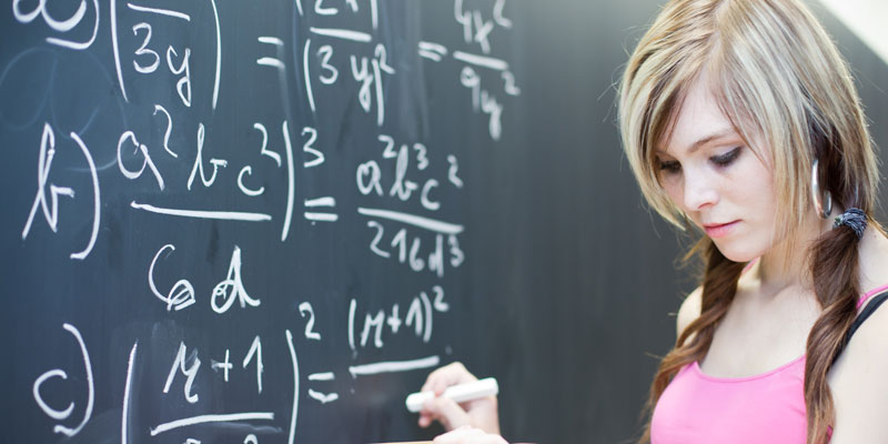 Girl doing calculations - Womanthology: Homepage